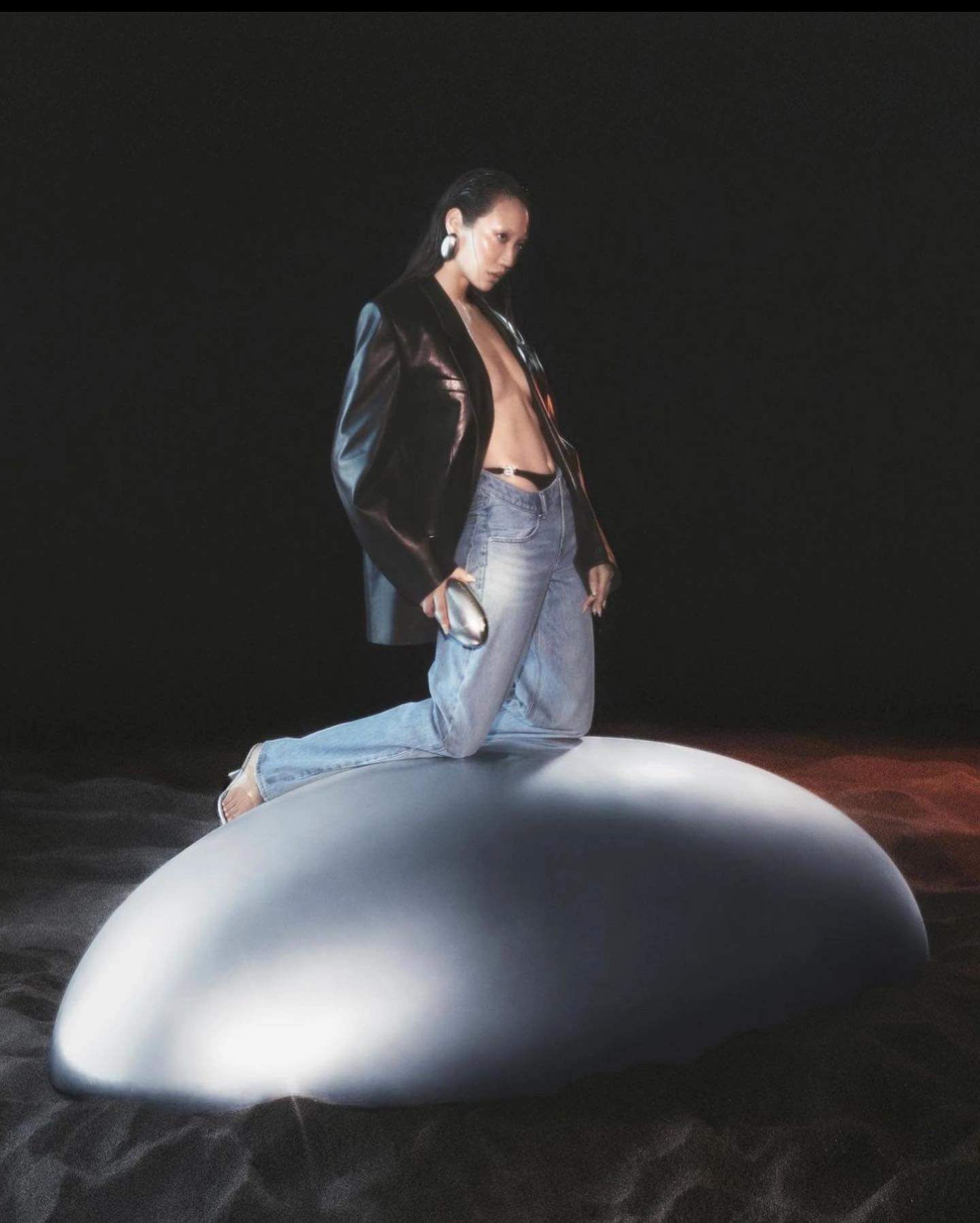 Luke Parker - Photo by Soo Joo on June 22, 2023. May be an image of 1 person, beanbag chair and ...