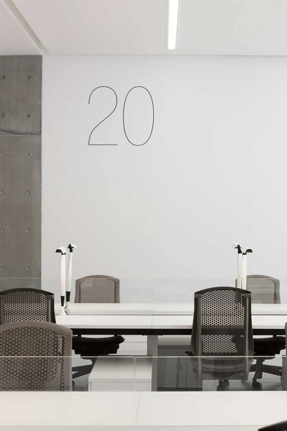 Paul DeCotiis - Studio workspace numbers are screened directly on the walls. – Savee